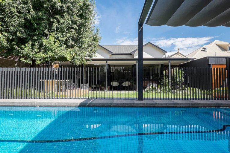 A sophisticated, sun smart backyard pool